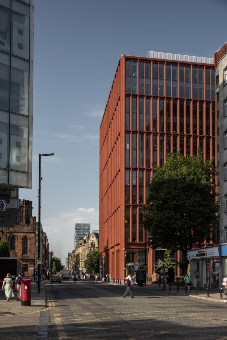 Glenn Howells completes terracotta-clad office block in Manchester