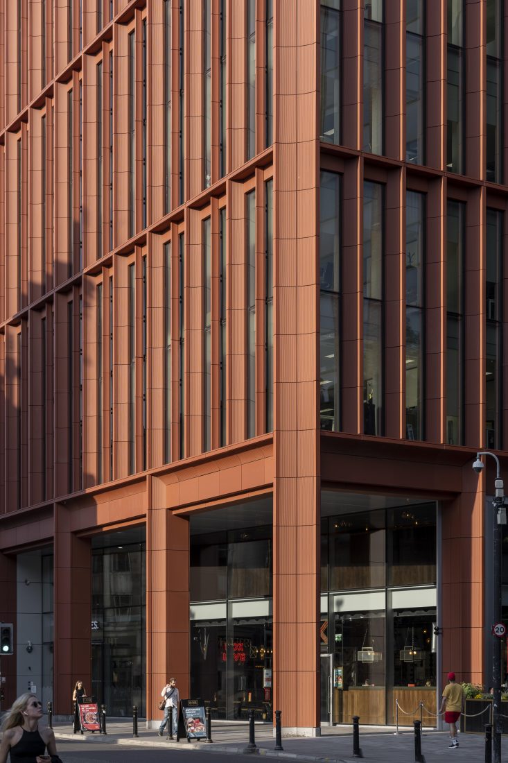 Glenn Howells completes terracotta-clad office block in Manchester