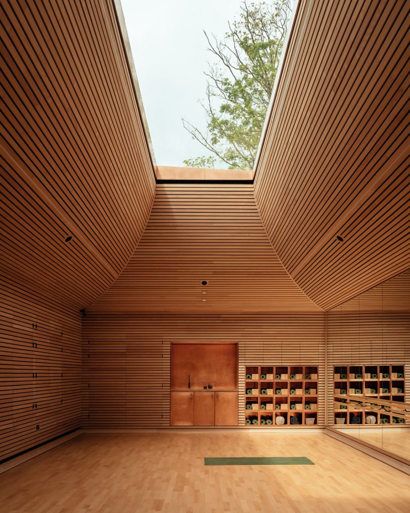 Invisible Studio completes rammed-stone yoga studio in Somerset