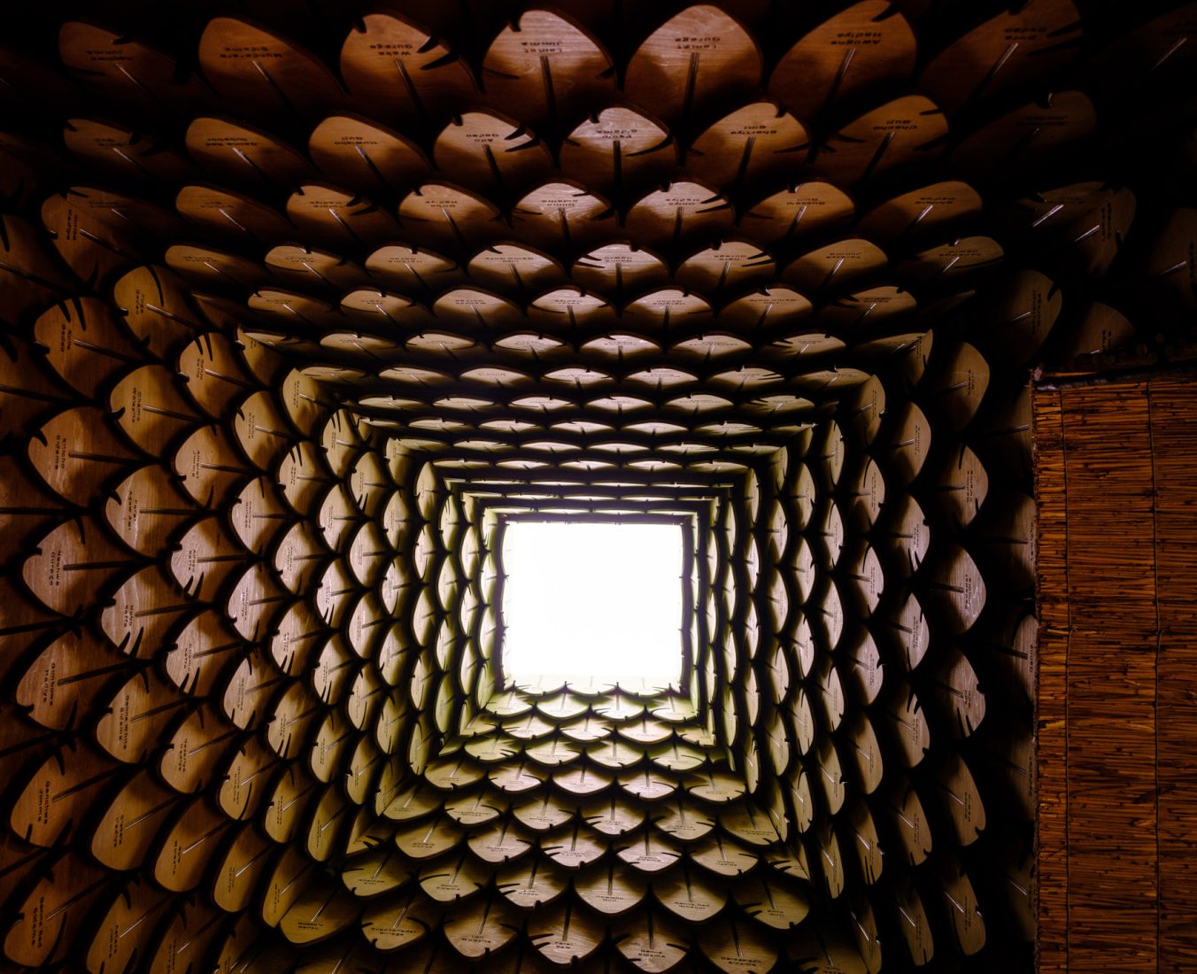 Flea Folly Architects create ‘false banana’ pavilion from hazel and reed