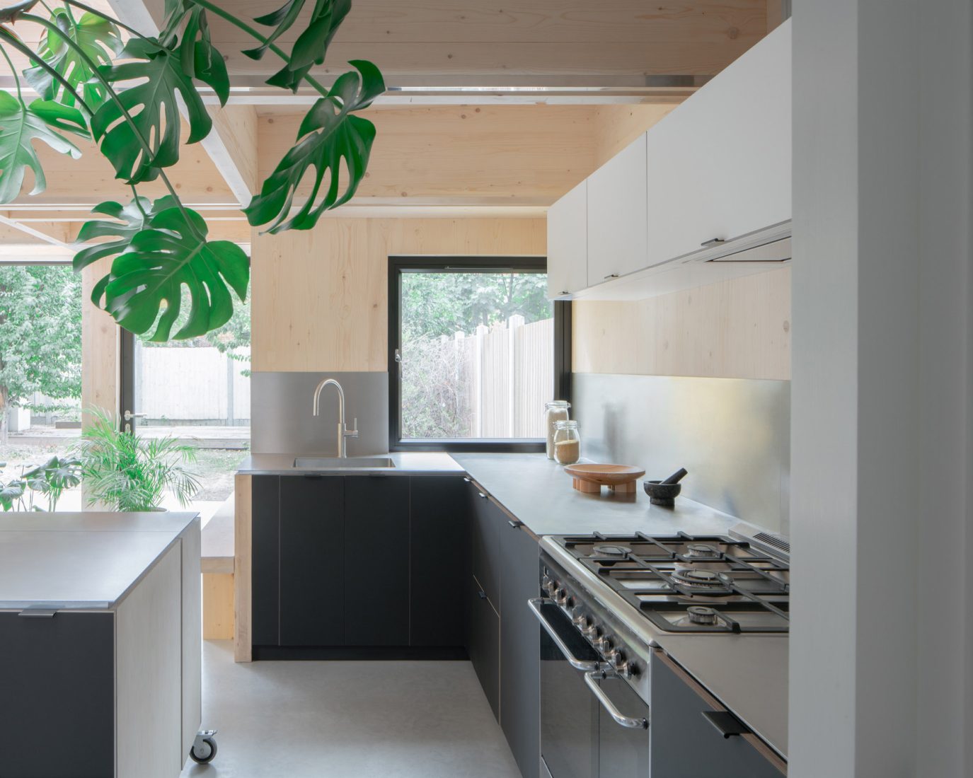 Unknown Works creates banana-yellow additions for house in Leyton