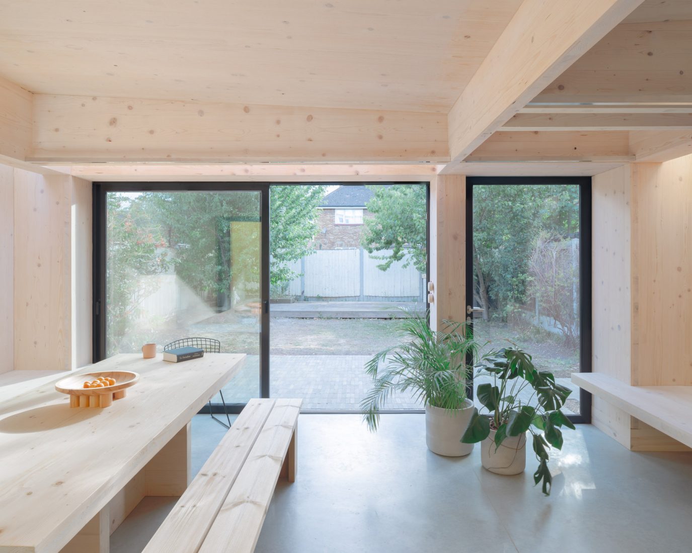 Unknown Works creates banana-yellow additions for house in Leyton