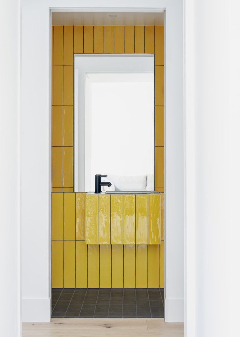 Unknown Works creates banana-yellow additions for house in Leyton