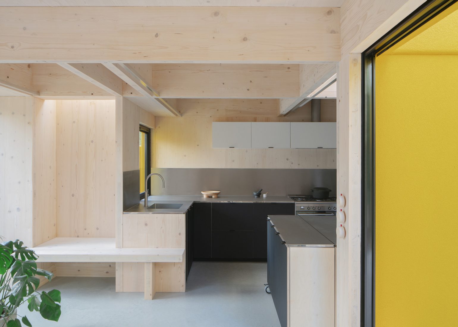 Unknown Works creates banana-yellow additions for house in Leyton