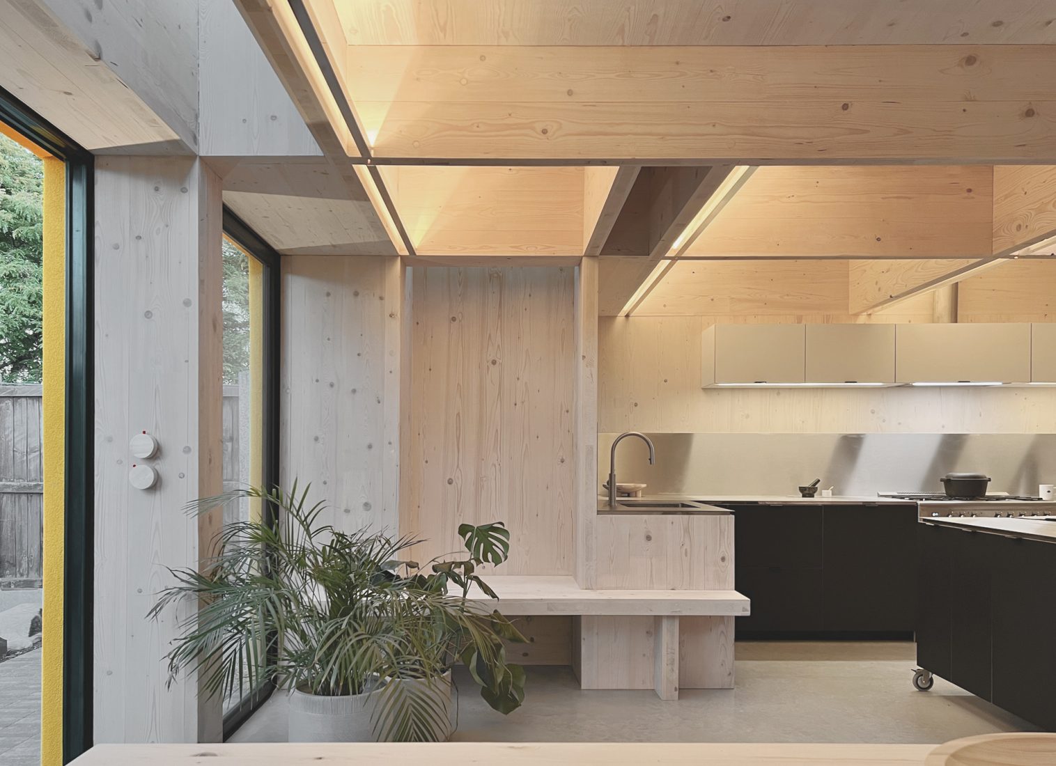 Unknown Works creates banana-yellow additions for house in Leyton