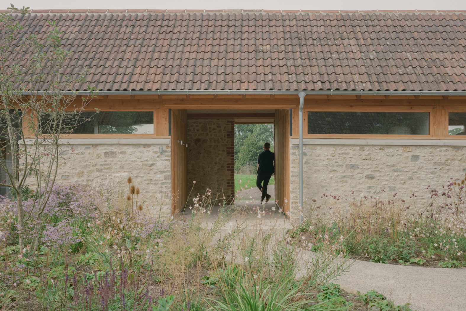 Clementine Blakemore restores derelict farm buildings into holiday home