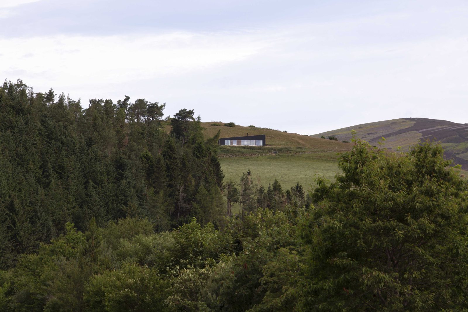 Brown & Brown completes hillside home in Scottish national park