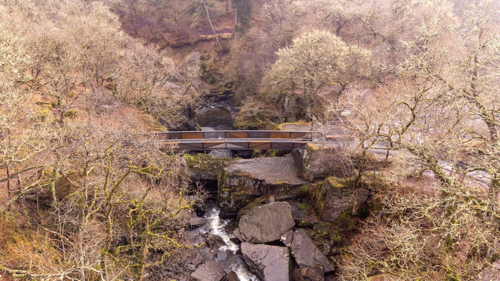 Beam Architects’ perforated steel footbridge in Perthshire opens