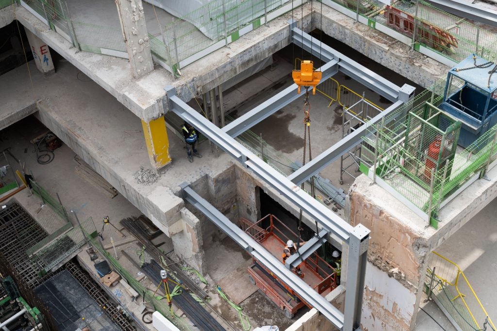 Pre-WWII steel beams from Oxford Street salvaged for office retrofit