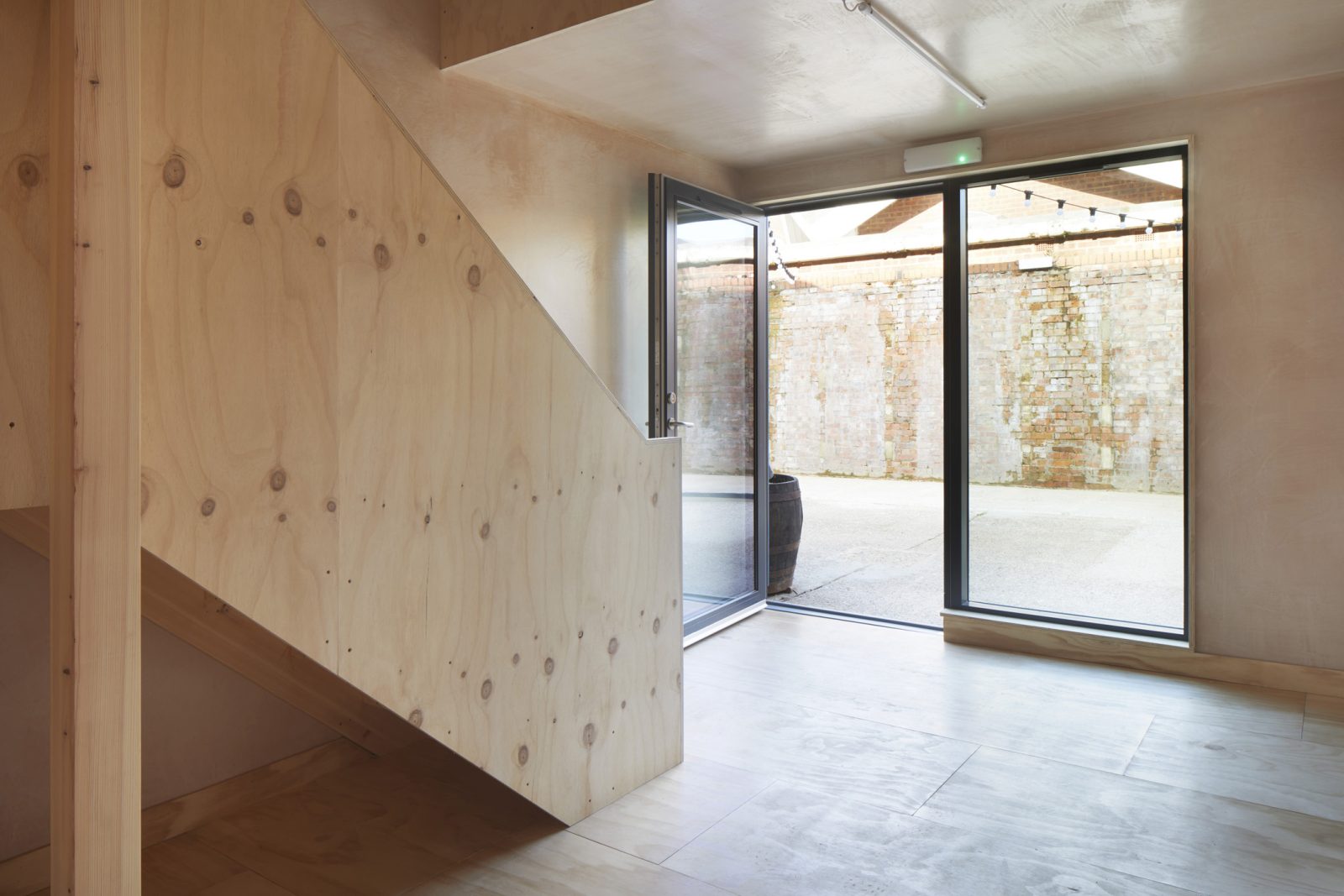 Jan Kattein Architects transforms Enfield garages into affordable ...