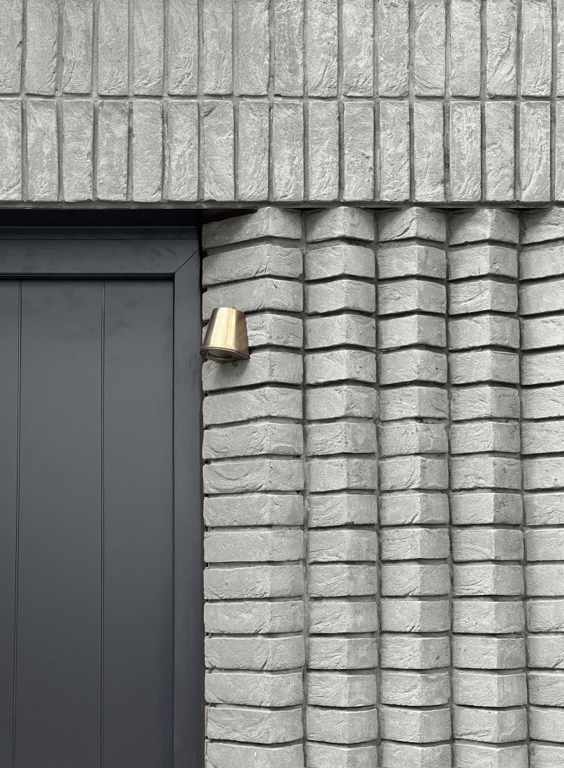 Dowen Farmer completes three homes on London garage site