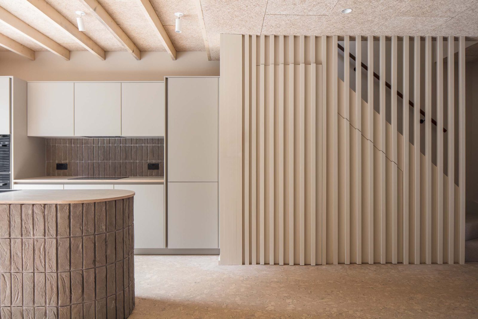 Dowen Farmer completes three homes on London garage site