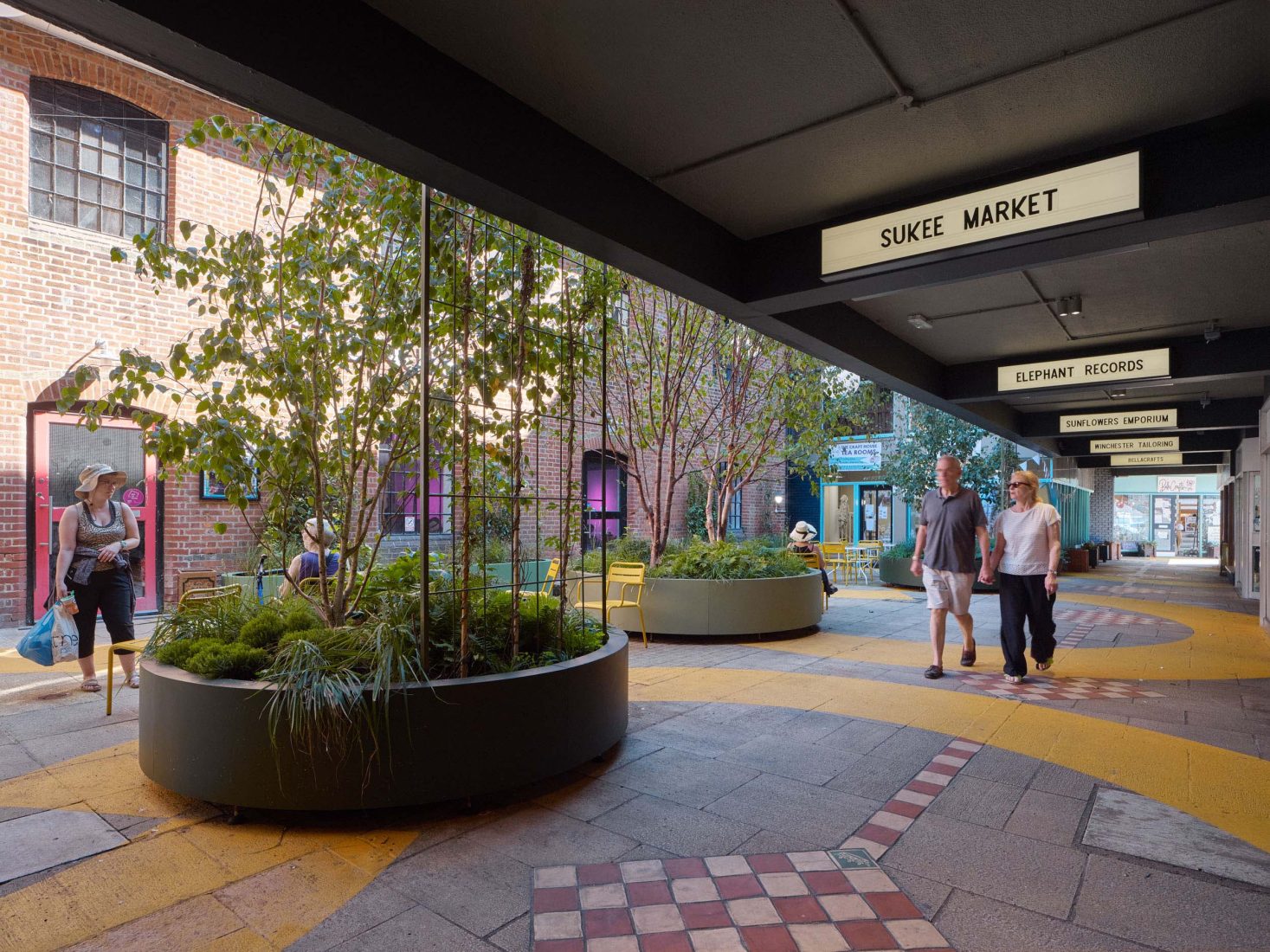 Studio Multi reactivates 1970s shopping arcade in Winchester