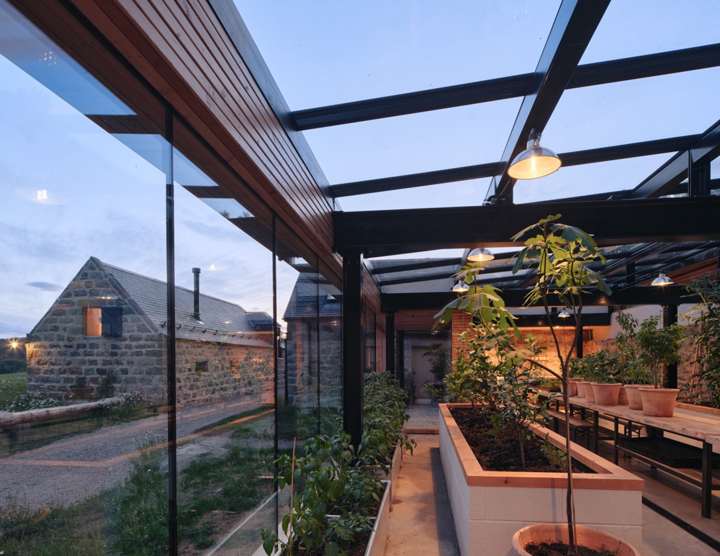 Moxon Architects converts Highland farmstead into guesthouse and studio