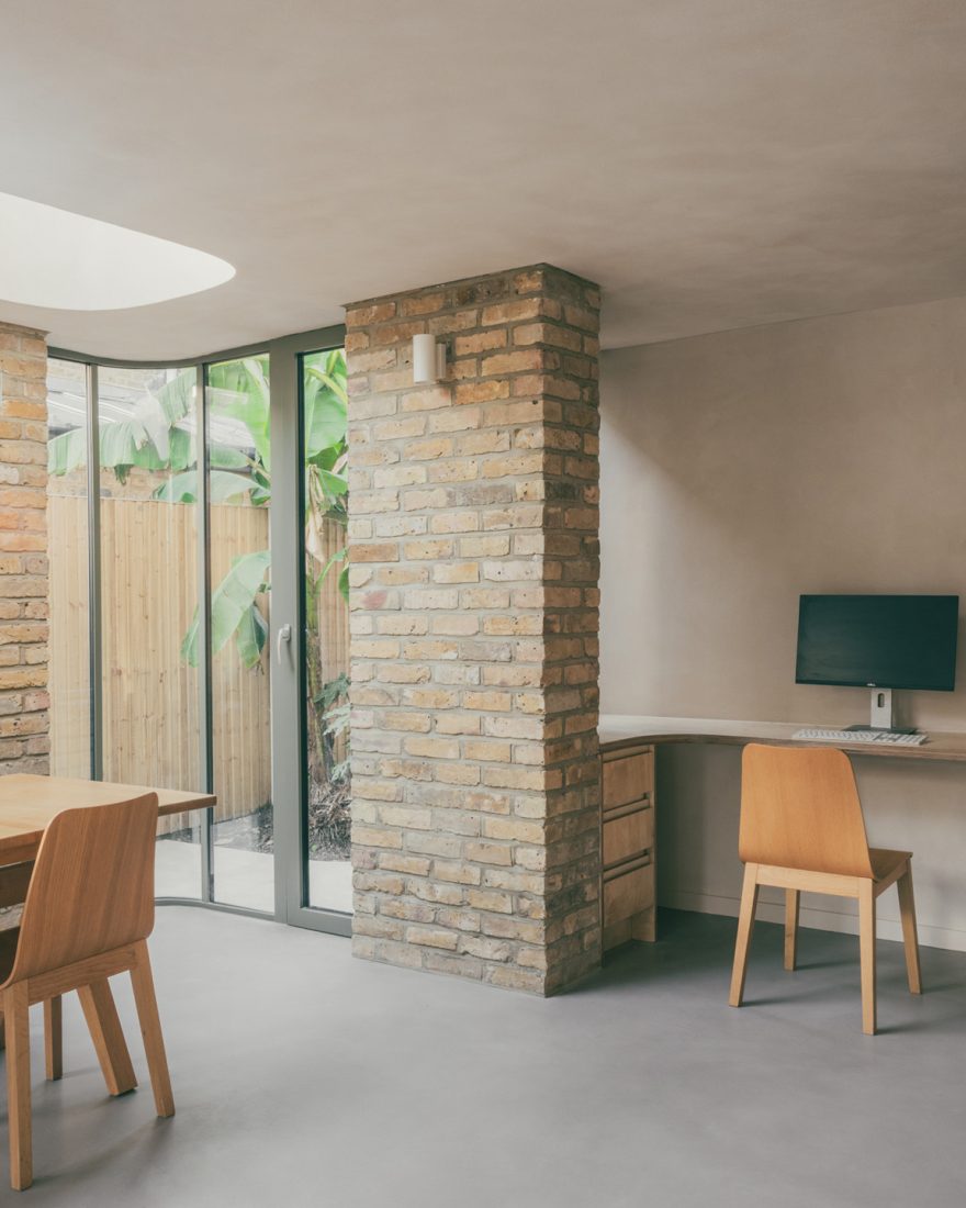 Pensaer completes curved glass-cornered extension in East Dulwich