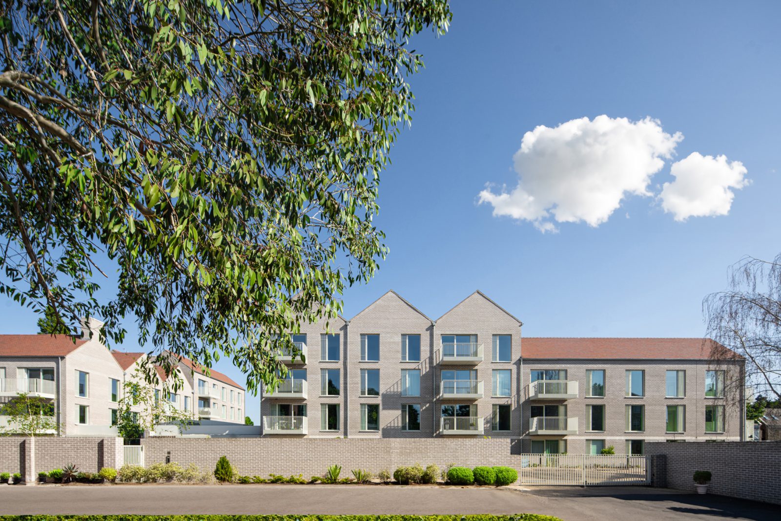 Coffey Architects completes ‘village life’-inspired later living housing