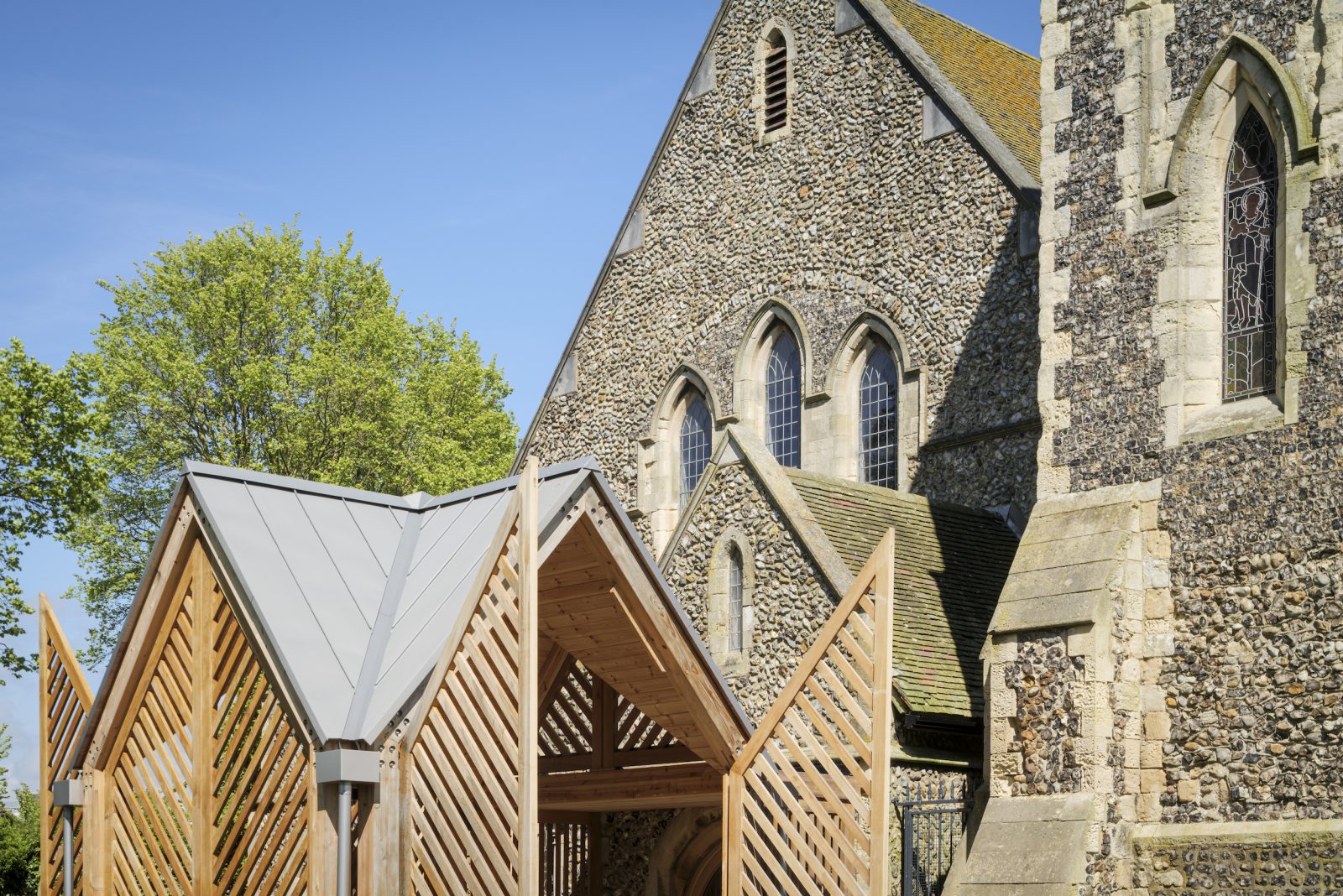 John Puttick Associates refurbishes Hove church, adding timber porch