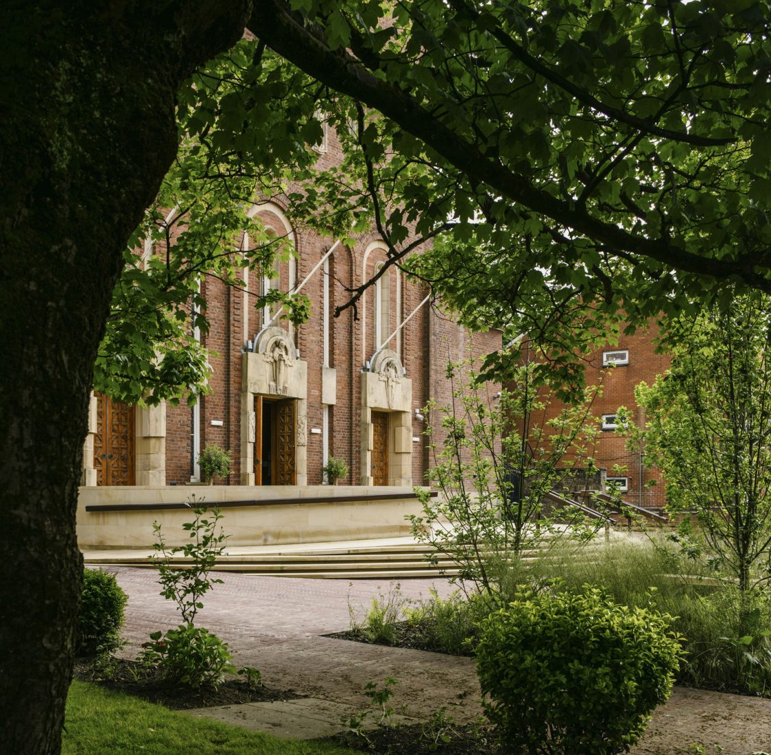 Loader Monteith creates piazza-like forecourt to Gillespie, Kidd & Coia ...
