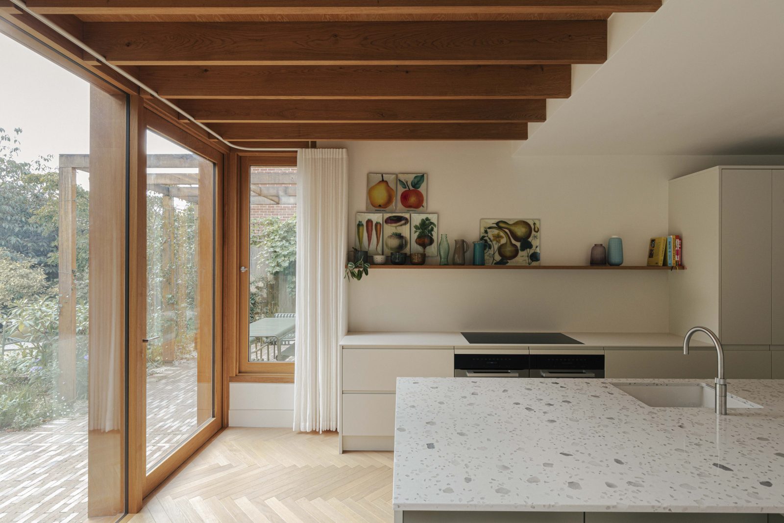 ROAR extends Grade II-listed house with oak-framed living space and pergola