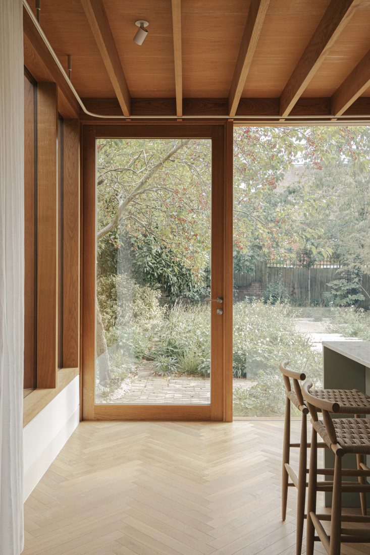 ROAR extends Grade II-listed house with oak-framed living space and pergola