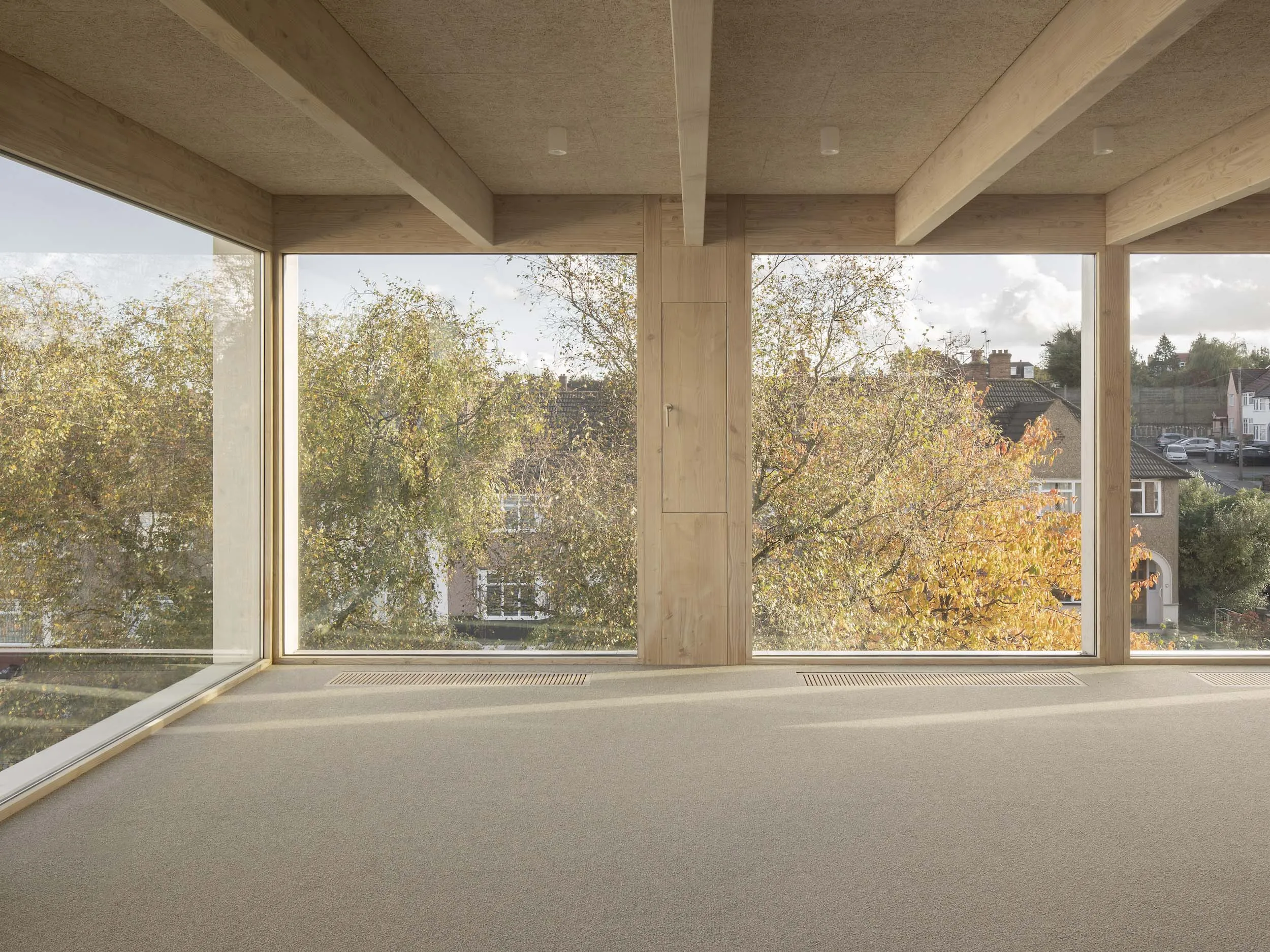 Thomas-McBrien Architects designs glulam ‘pavilion’ atop contractor’s HQ