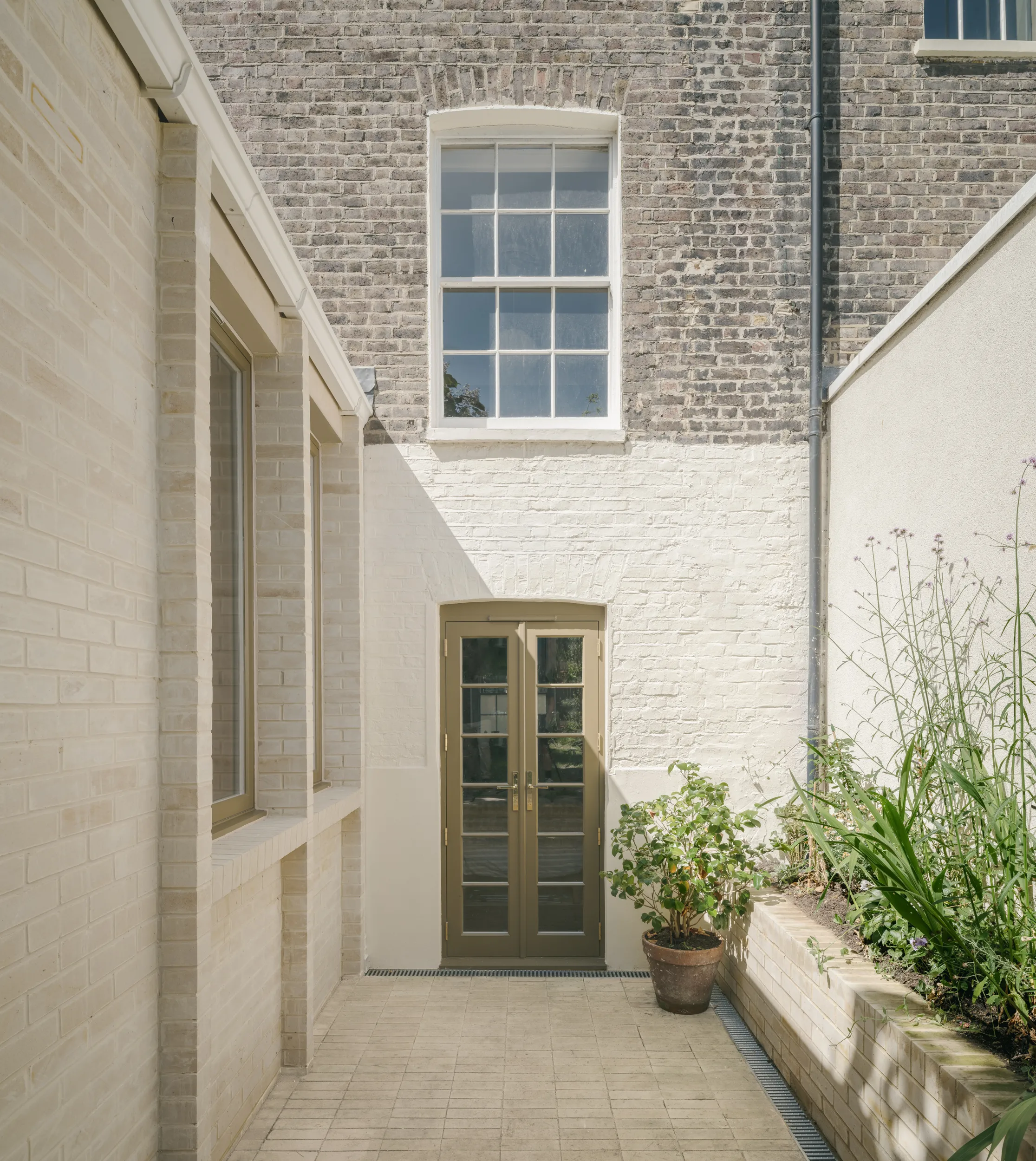 Studio Folk transforms listed terrace with stone brick extension
