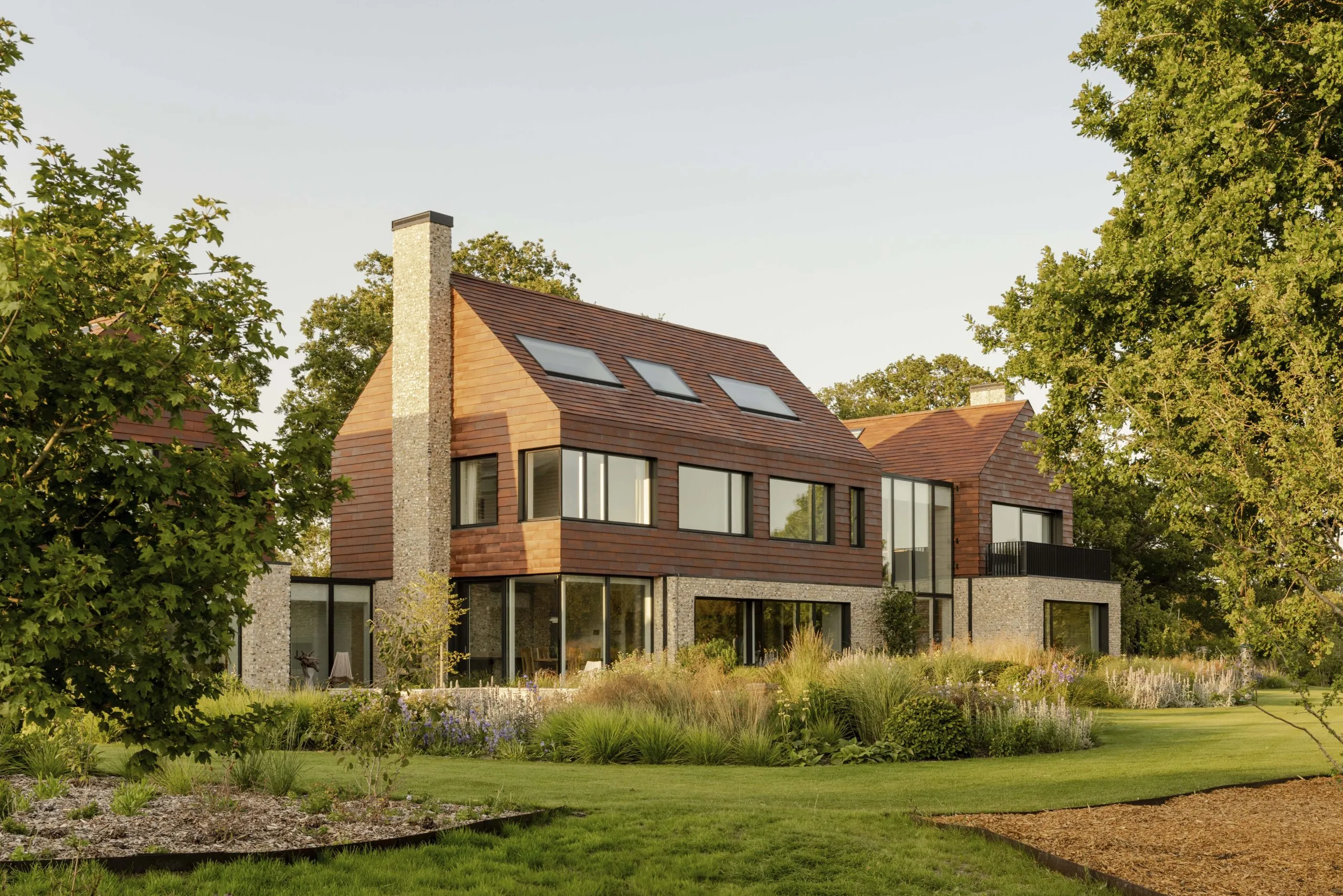 Selencky Parsons completes flint and clay tile-clad house in South Downs