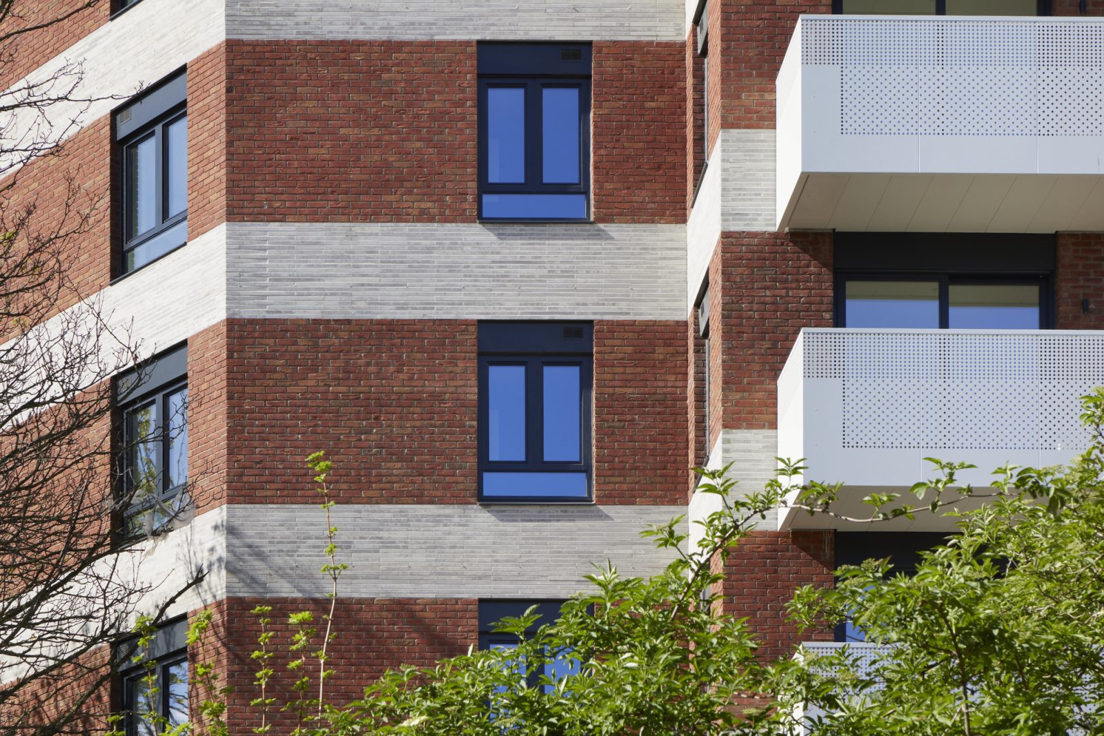 GRID Architects completes housing tower for vulnerable women